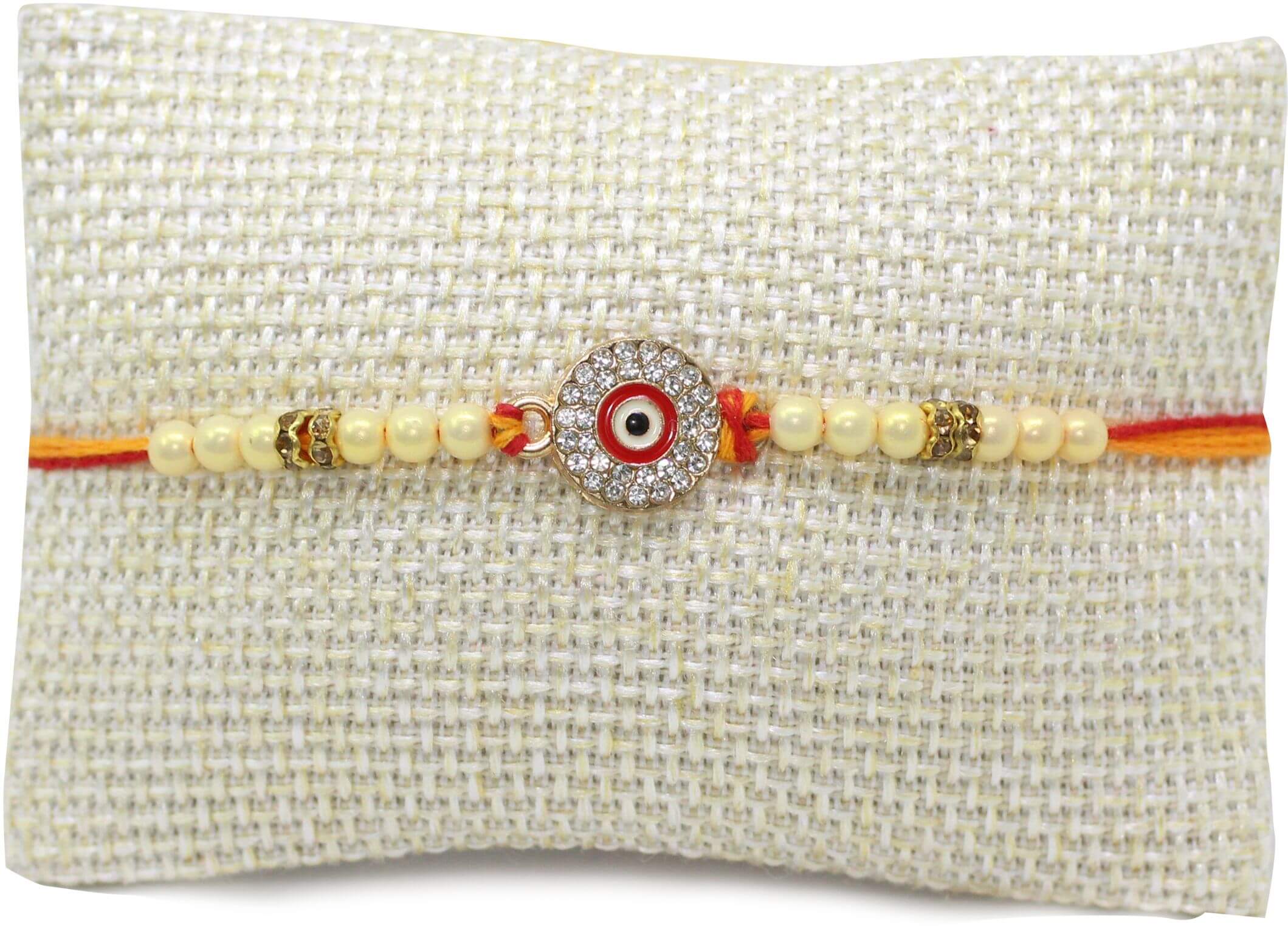 Evil Eye String Rakhi with Dry Fruits in Designer Pink Colour Potli and ...